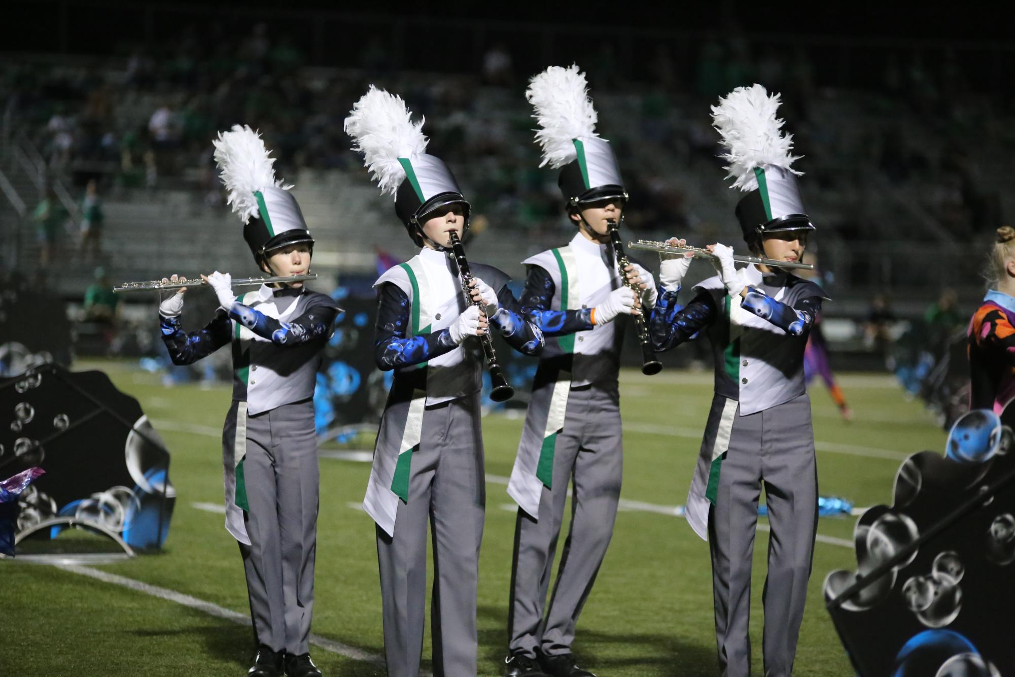 Band director Brandon Lesando and section leader Reagan Toman talk ...